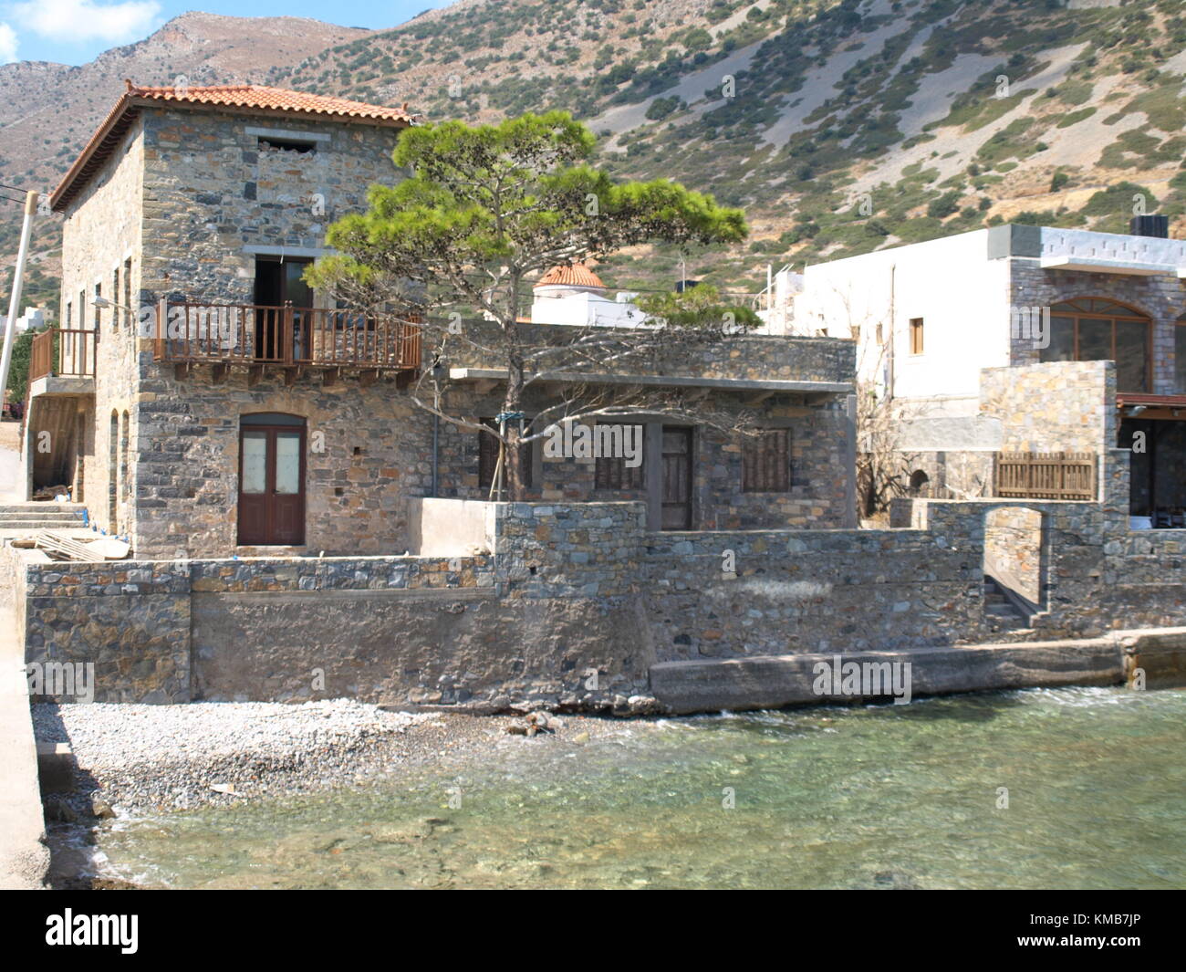 Old stone beach house at Elunda crete Stock Photo - Alamy