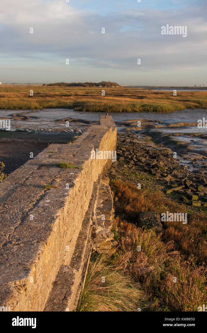 Wall of a disused harbour in the Swale estuary Stock Photo - Alamy
