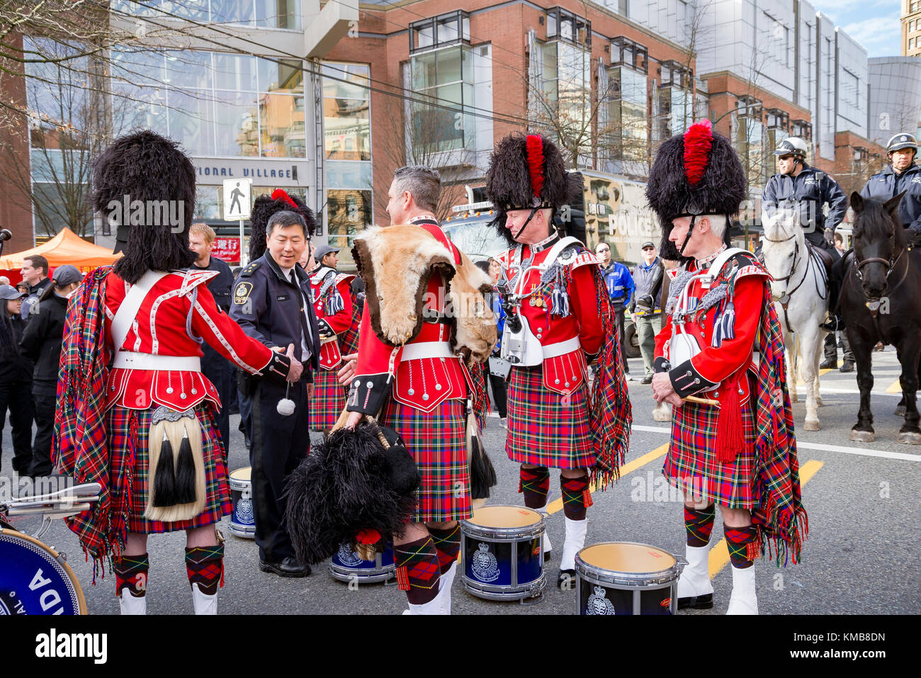 Vancouver Police Chief Jim Chu greets Police Pipe Band before parade ...