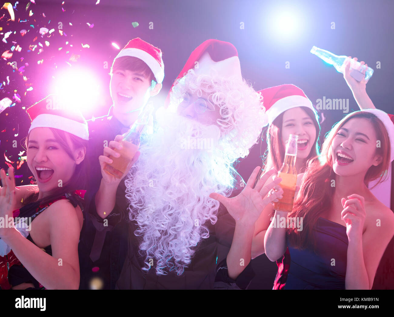 young group Enjoying Christmas party and having fun Stock Photo - Alamy