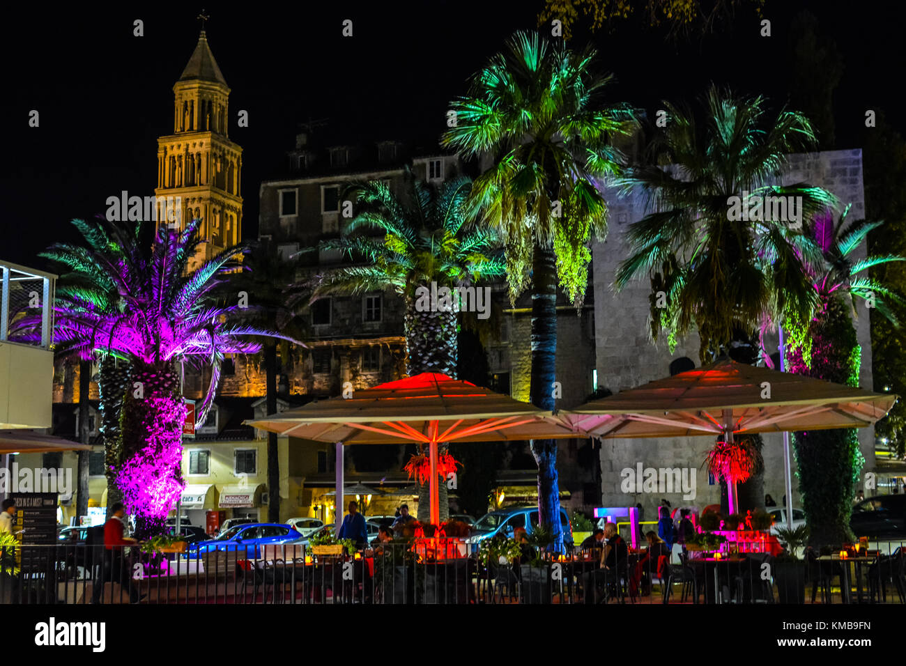 A colorful sidewalk cafe on the Riva promenade boardwalk in Split ...