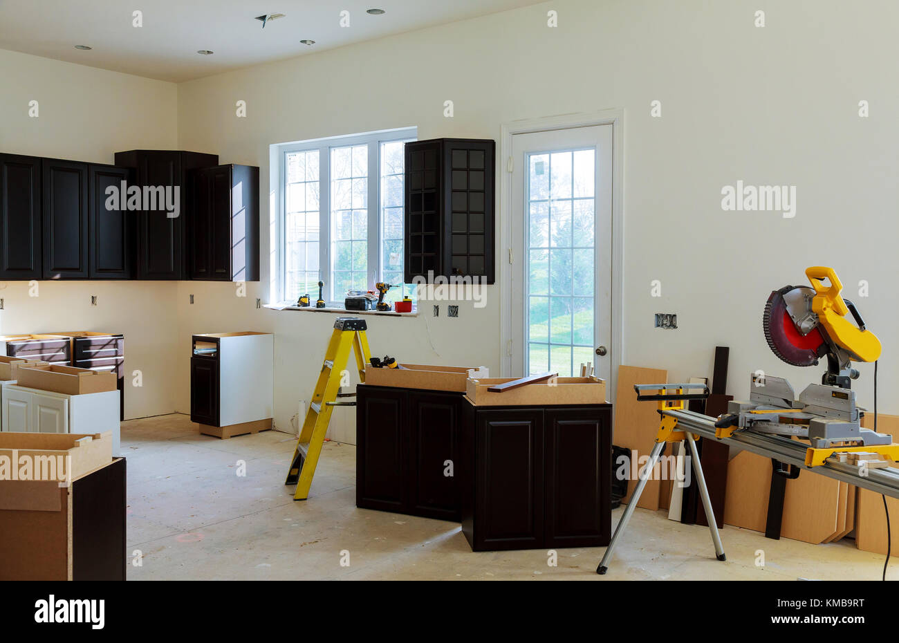 Installing new induction hob in modern kitchen cabinets installation ...