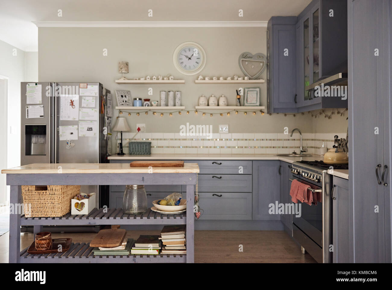 Kitchen and dining area in background hi-res stock photography and ...