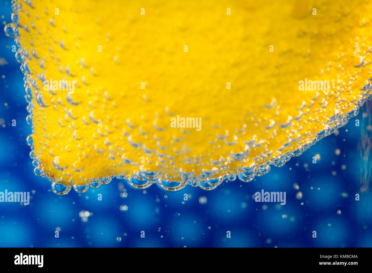 Lemon in bubbles Stock Photo - Alamy