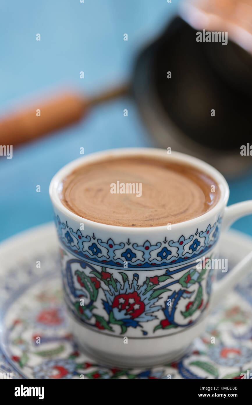 turkish coffee served in a traditional cup on wooden back ground Stock ...
