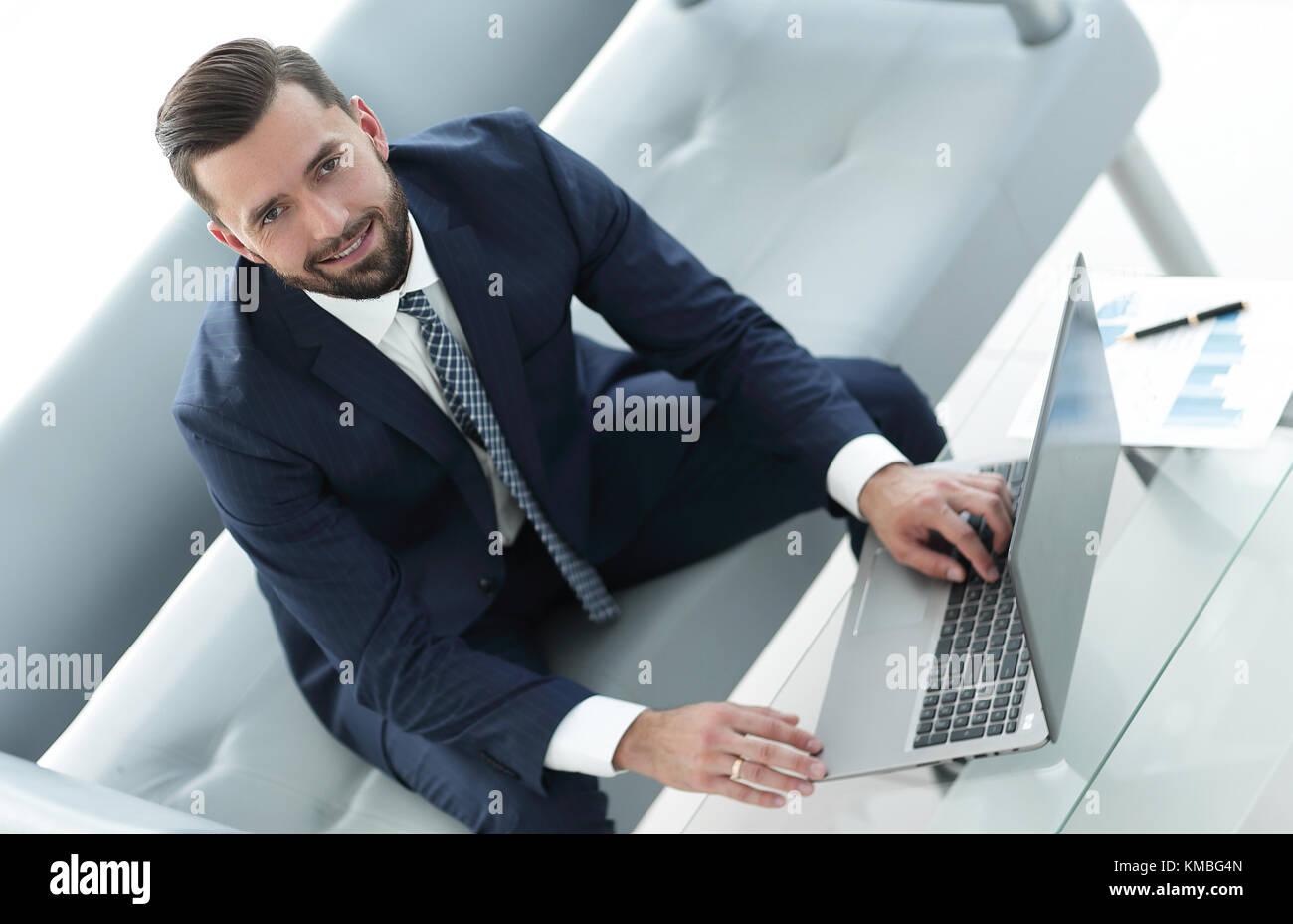 Top view of businessman working on laptop in office Stock Photo - Alamy