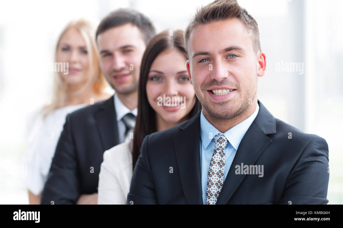 closeup. leader standing in front of the business team Stock Photo - Alamy