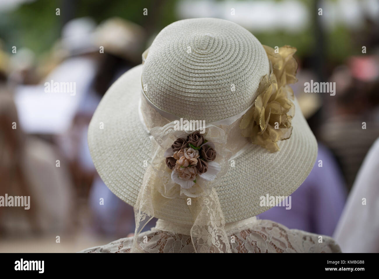 Rear view of a woman with hat Stock Photo - Alamy