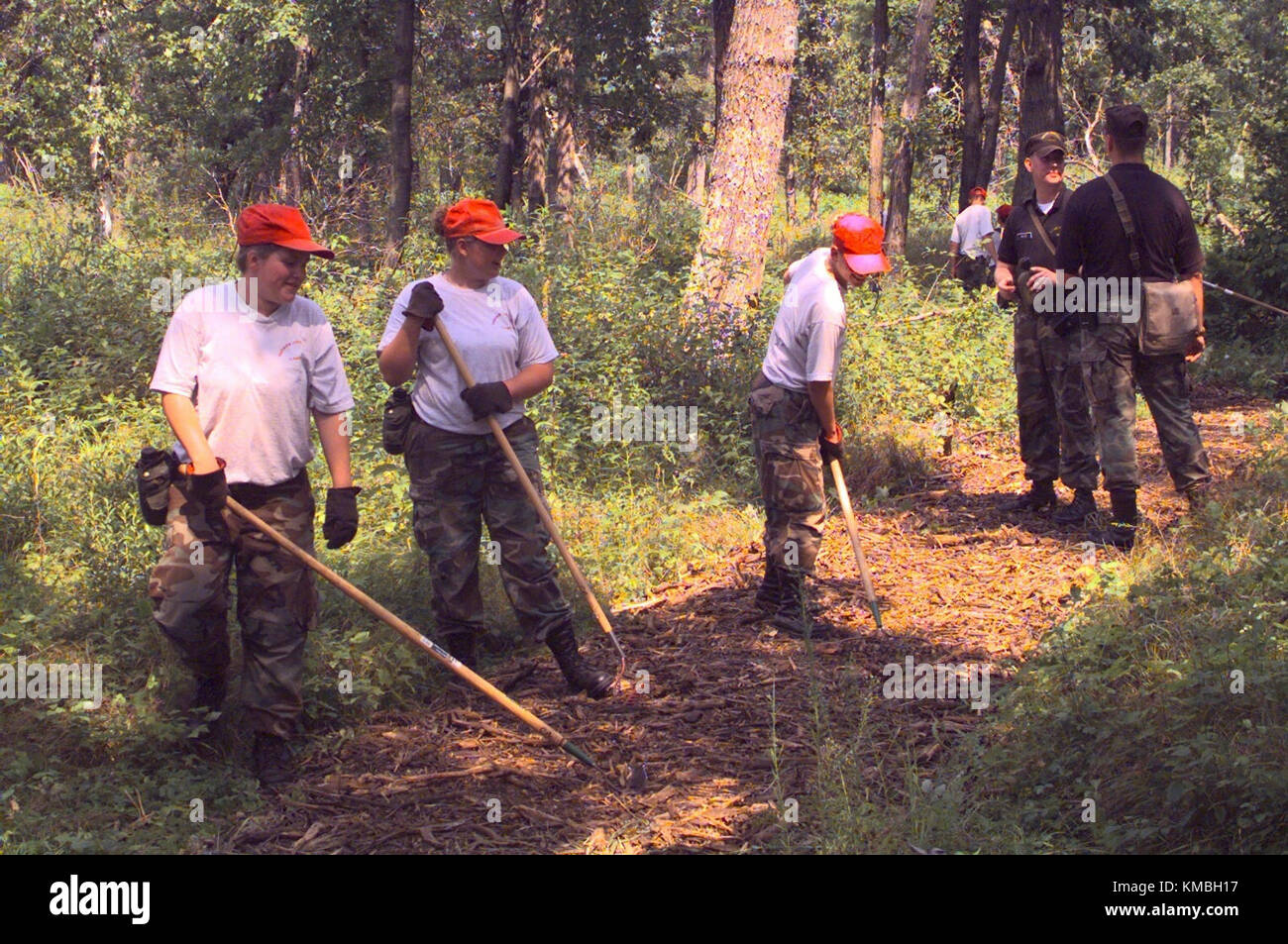 Badger Challenge cadets work on a walking trail near the Wisconsin ...