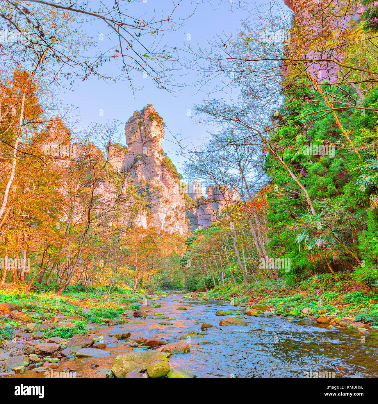 Small river between the colorful cliffs Stock Photo - Alamy