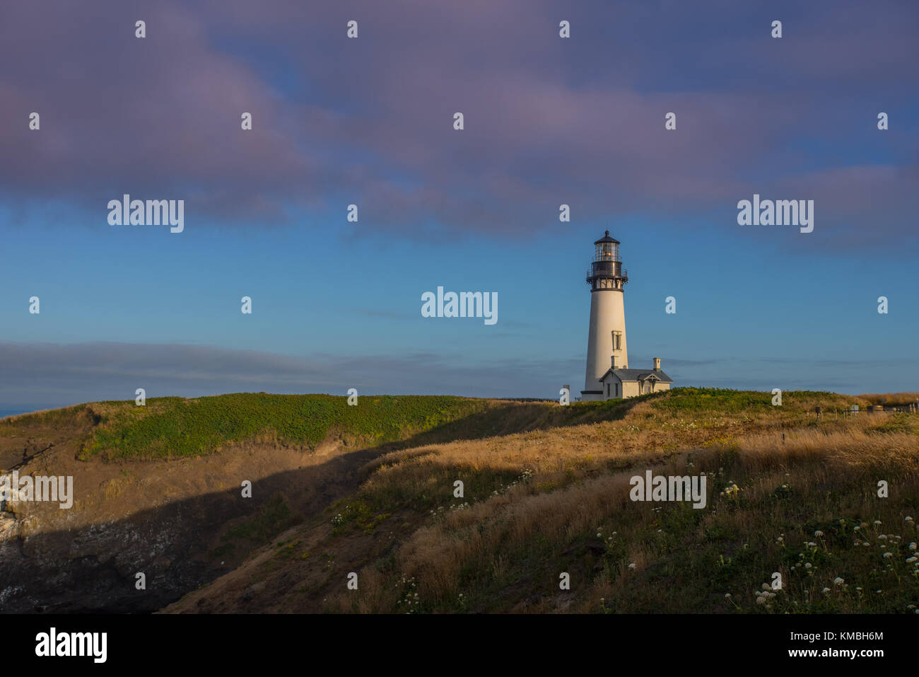 Yaquina Head Lighthouse Along Oregon Coast with copy space Stock Photo ...