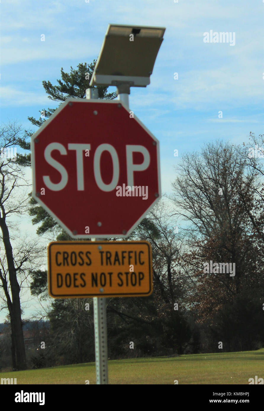 A flashing stop sign powered by solar energy is shown Nov. 28, 2017, on ...
