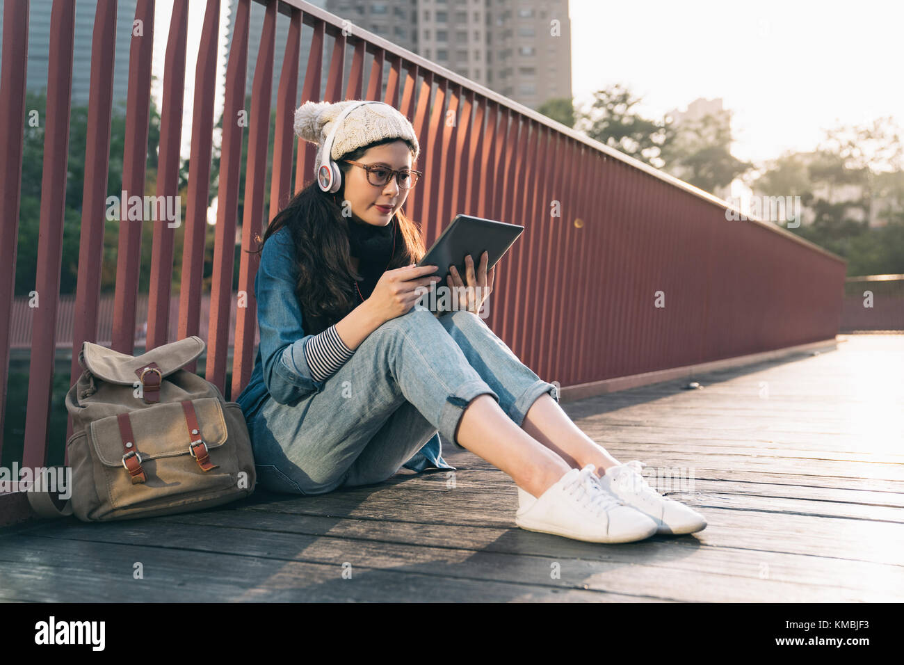 Single Asia student searching information online with a tablet in the ...