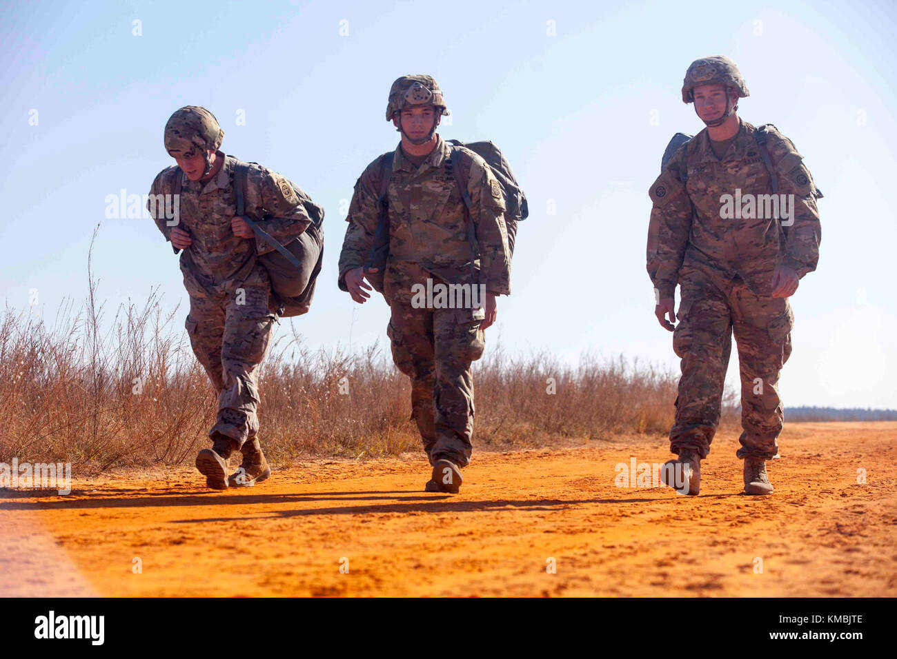 U.S. Army paratroopers walks off Sicily Drop Zone during the 20th ...