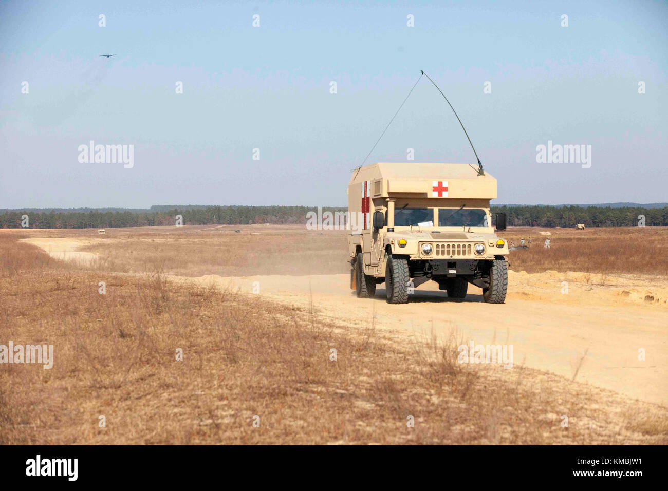 A Medic High Mobility Multipurpose Wheeled Vehicle (HMMWV) drives on ...