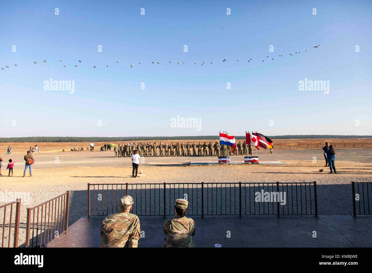 U.S. Army paratroopers stand in formation to receive their Swedish jump ...