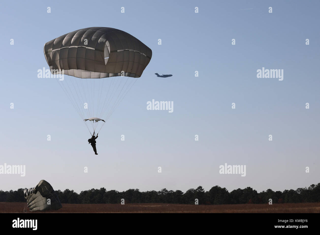 U.S. Army Paratrooper Spc. Aaron Garvin assigned to the 108th Military ...