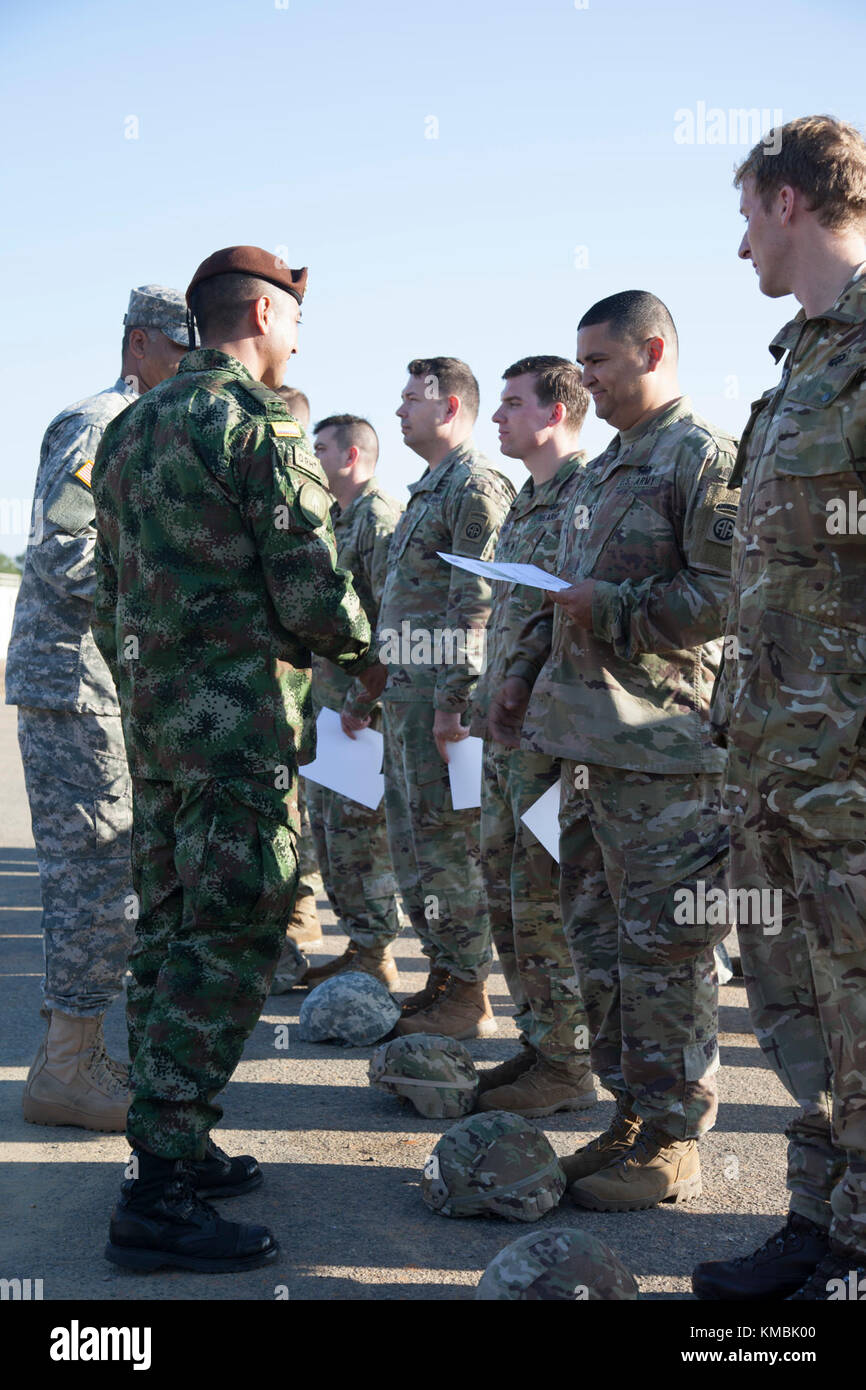 U.S Army paratroopers receives their foreign jump wings from a ...