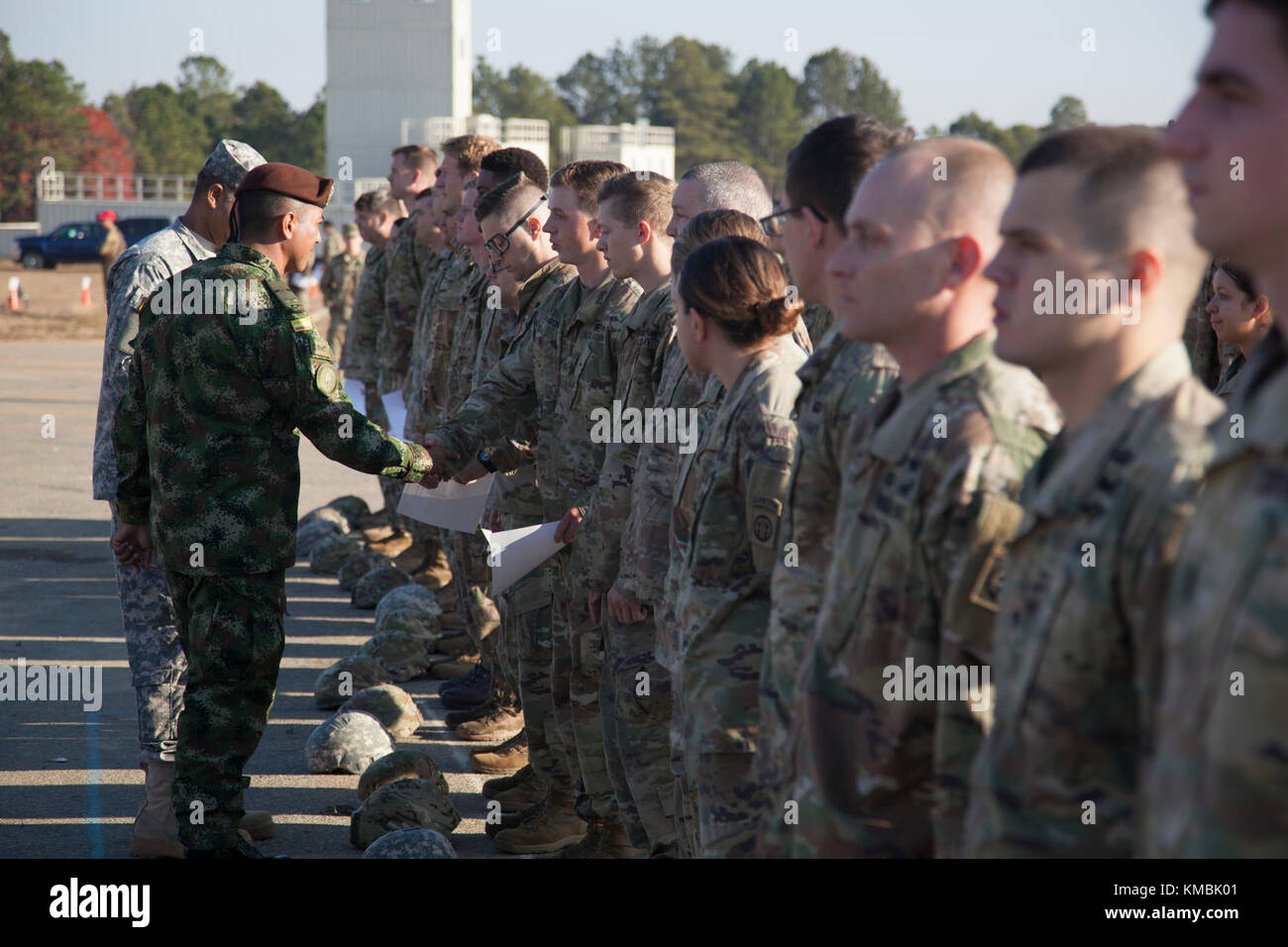 U.S Army paratroopers receives their foreign jump wings from a ...