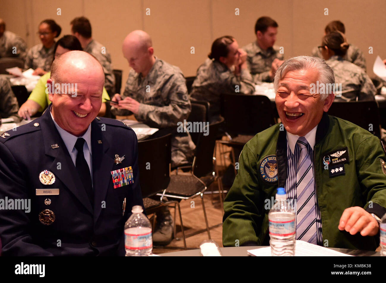 Col. Robert Riegel, 460th Space Wing vice commander, enjoys a laugh ...