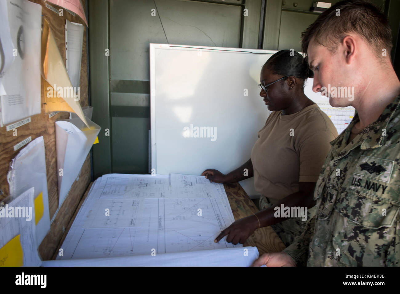 U.S. Navy Builder 3rd Class Kiara Harris and Builder 3rd Class ...