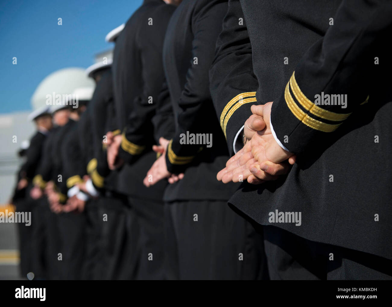 Sailors stand at parade rest during the Amphibious Squadron 5 (CPR 5 ...