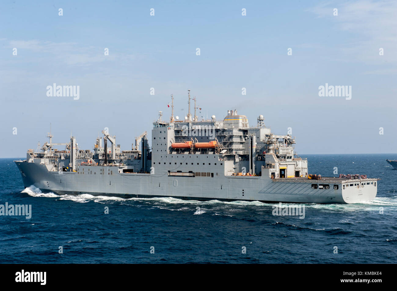 The dry cargo and ammunition ship USNS Alan Shepard (T-AKE 3) pulls ...