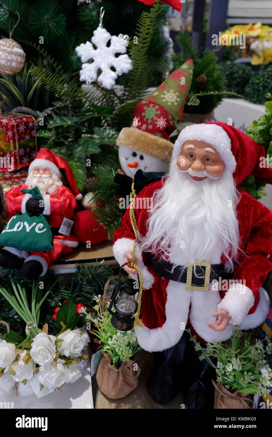 Christmas Decorations Santa dolls, snowman and pine trees Stock Photo ...