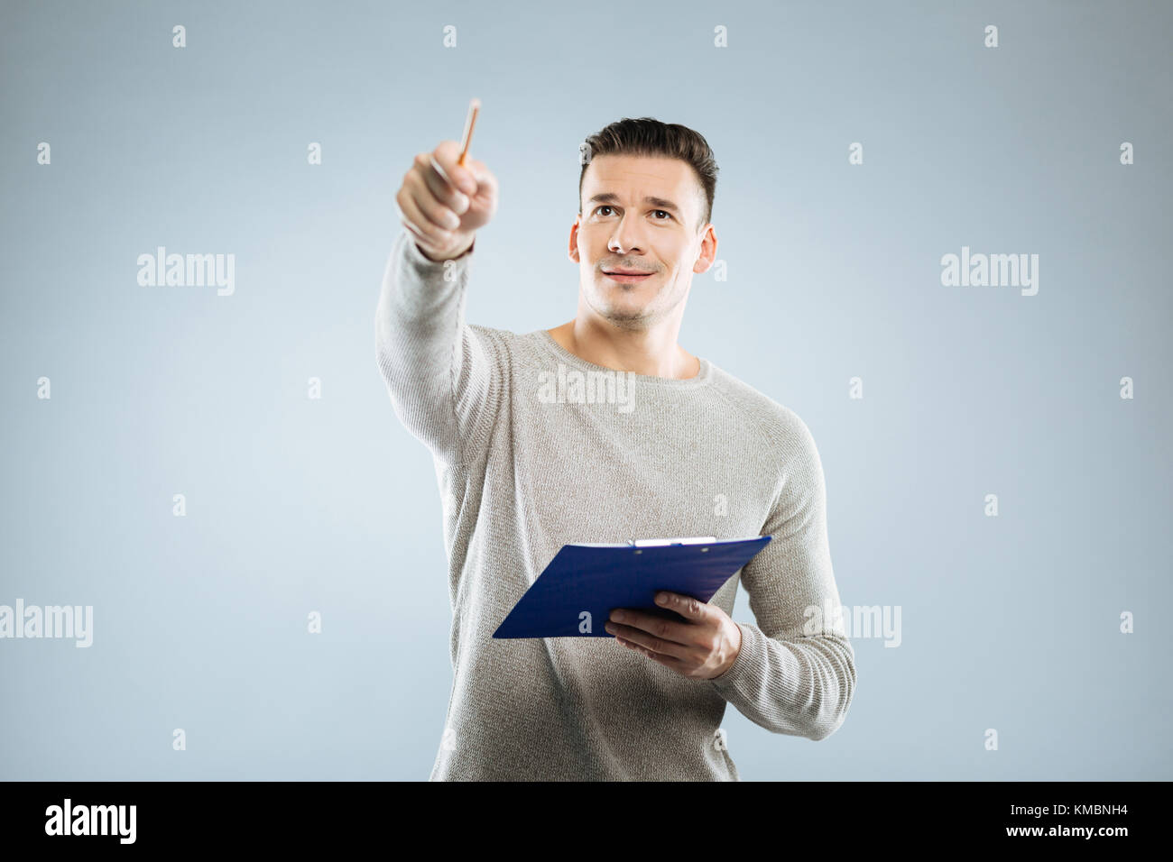 Handsome male person looking forward Stock Photo - Alamy