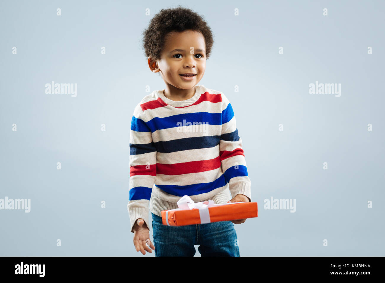 Positive delighted boy posing on camera Stock Photo - Alamy