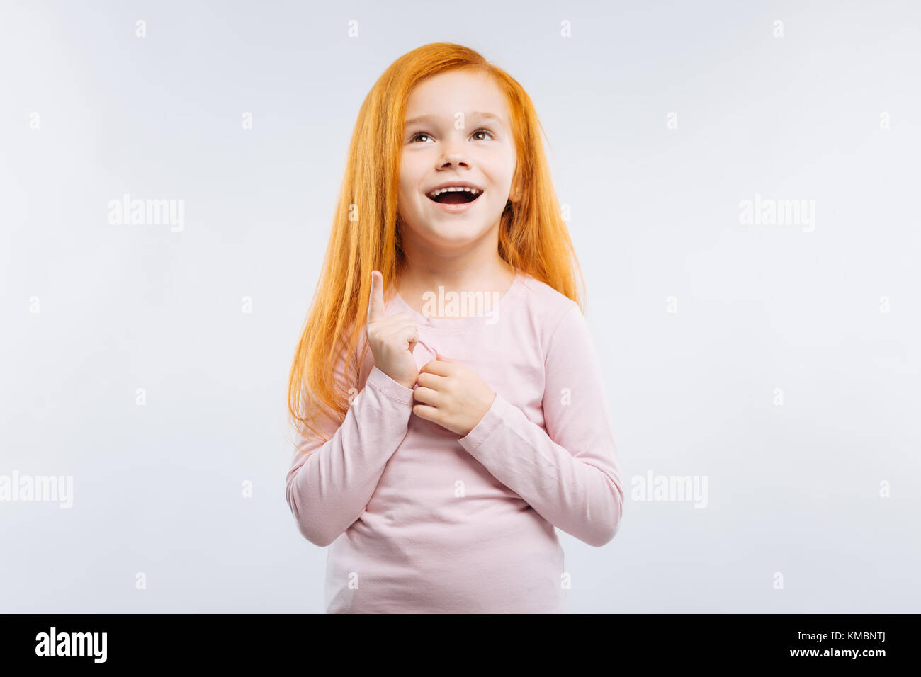 Dreamy child thinking about good plan Stock Photo - Alamy