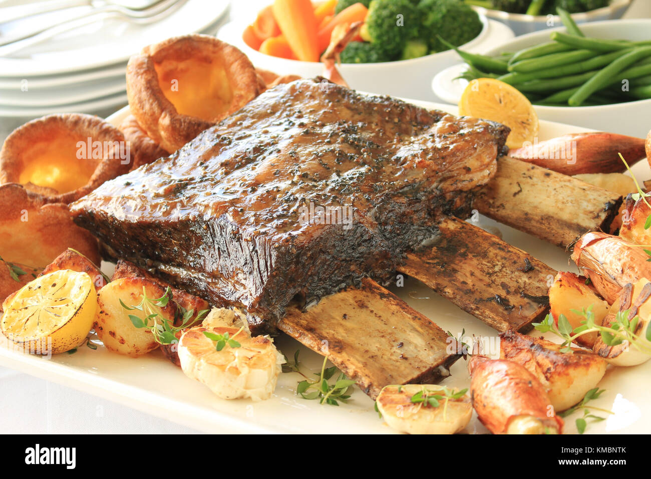 large beef rib sunday roast dinner Stock Photo - Alamy