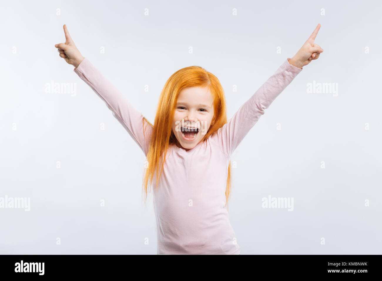 Happy girl celebrating her success Stock Photo - Alamy