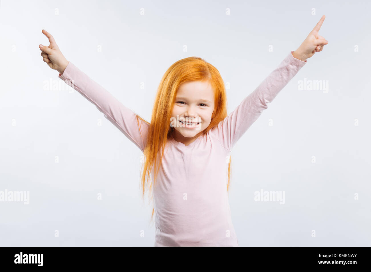 Delighted child posing on camera Stock Photo - Alamy