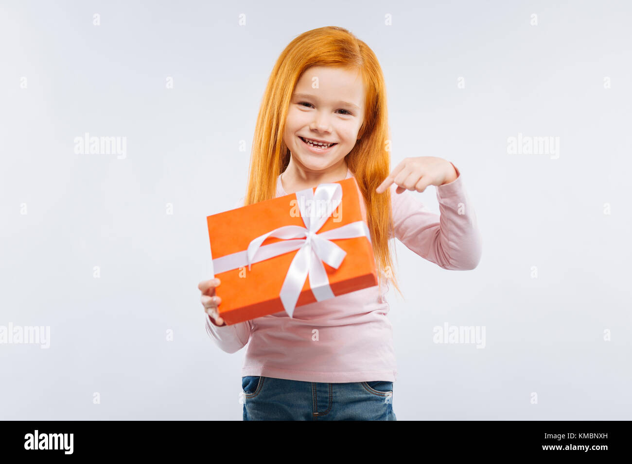 Funny little female looking at camera Stock Photo - Alamy