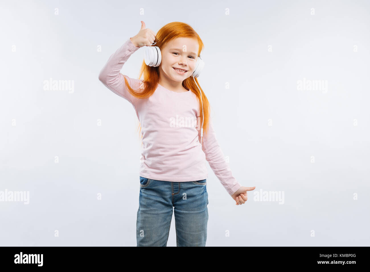 Attractive red-haired child showing her emotions Stock Photo - Alamy