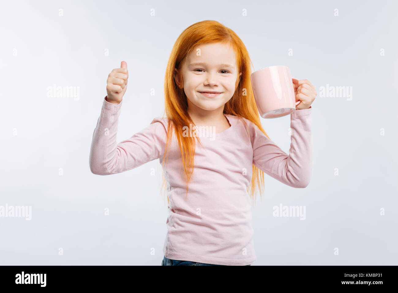 Pretty girl being very glad Stock Photo - Alamy