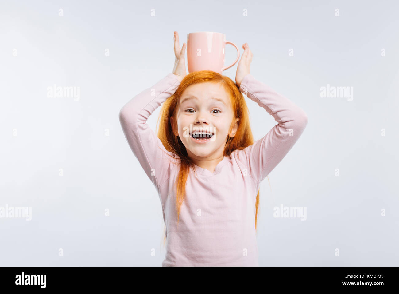 Positive delighted child posing on camera Stock Photo - Alamy