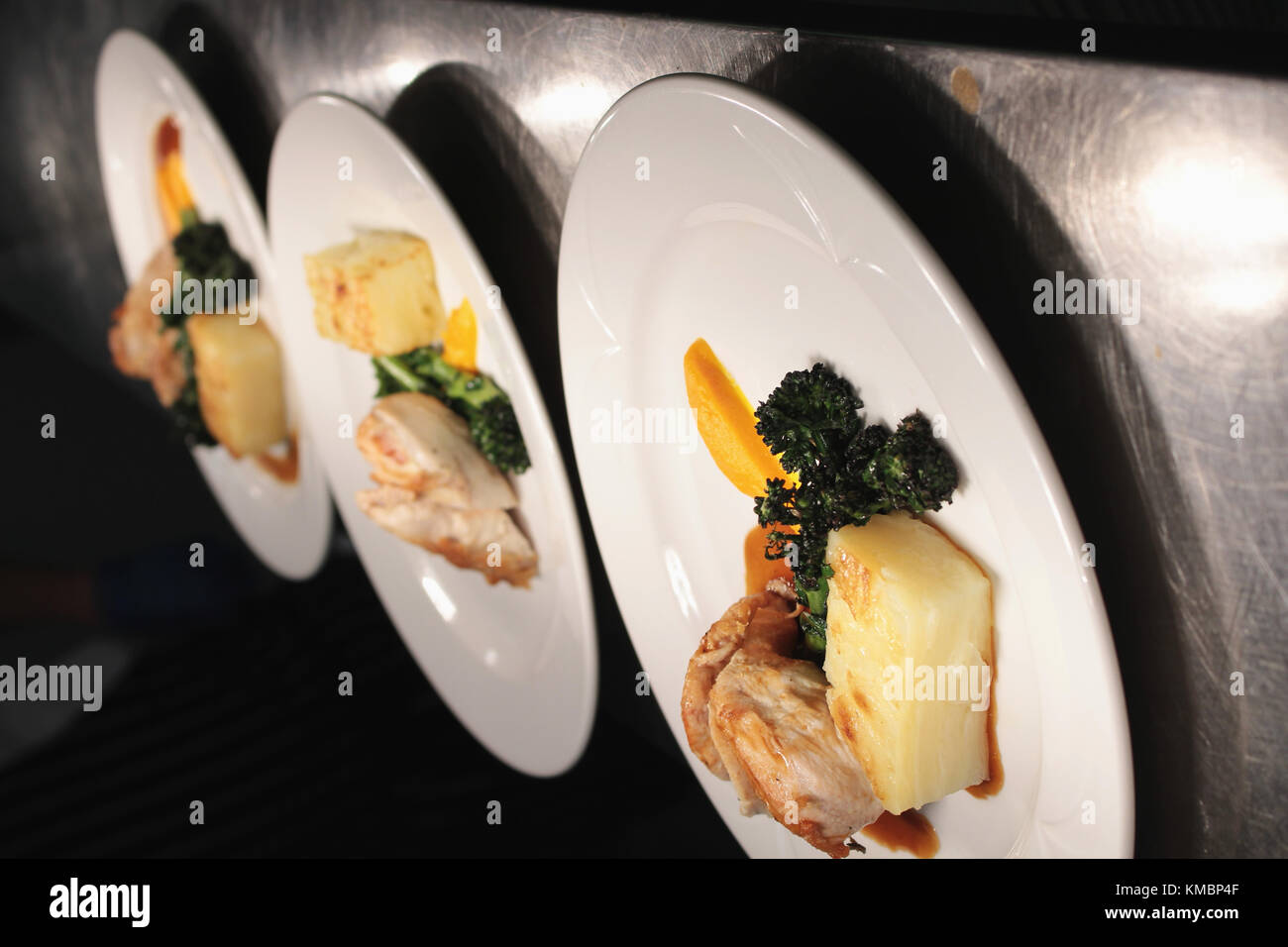 plated food in kitchen Stock Photo - Alamy