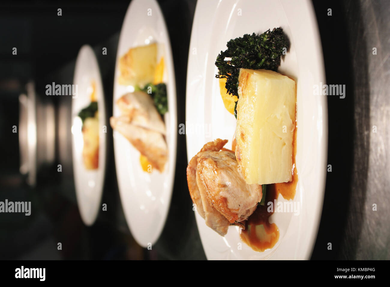 plated food in kitchen Stock Photo - Alamy