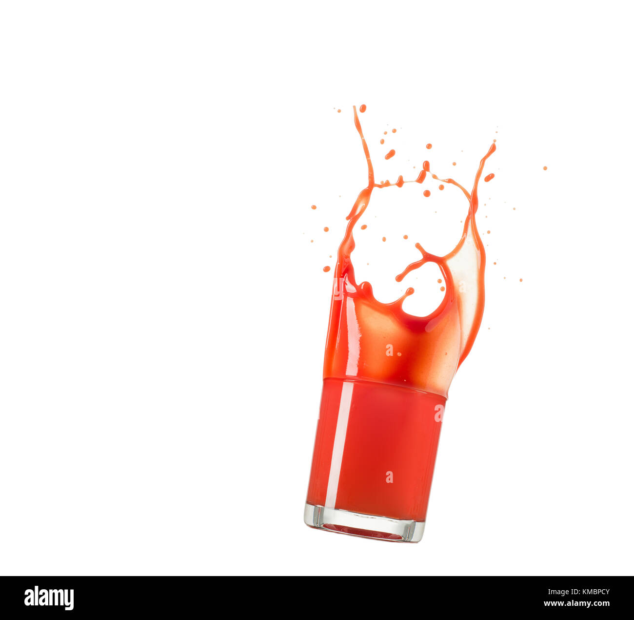 Glass of splashing tomato juice isolated on white. Tomato splash Stock ...