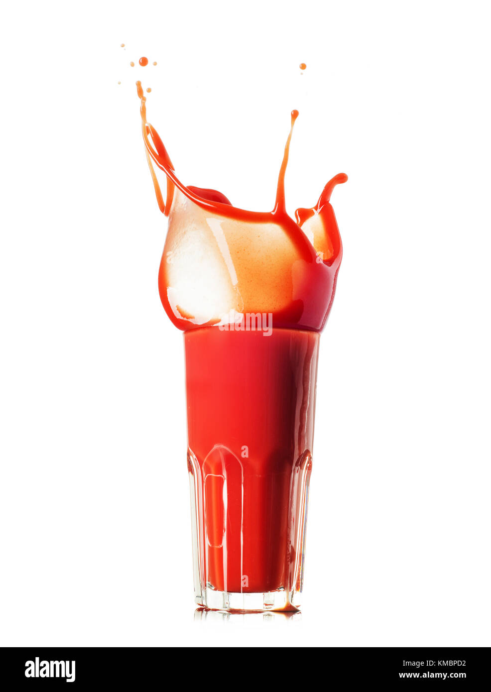 Glass of splashing tomato juice isolated on white. Tomato splash Stock ...