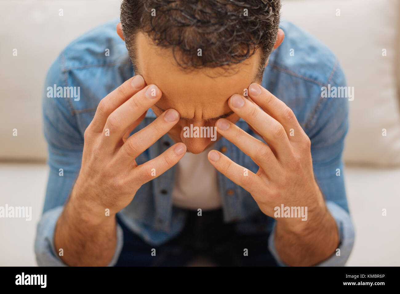 Unhappy disappointed man thinking about his situation Stock Photo - Alamy