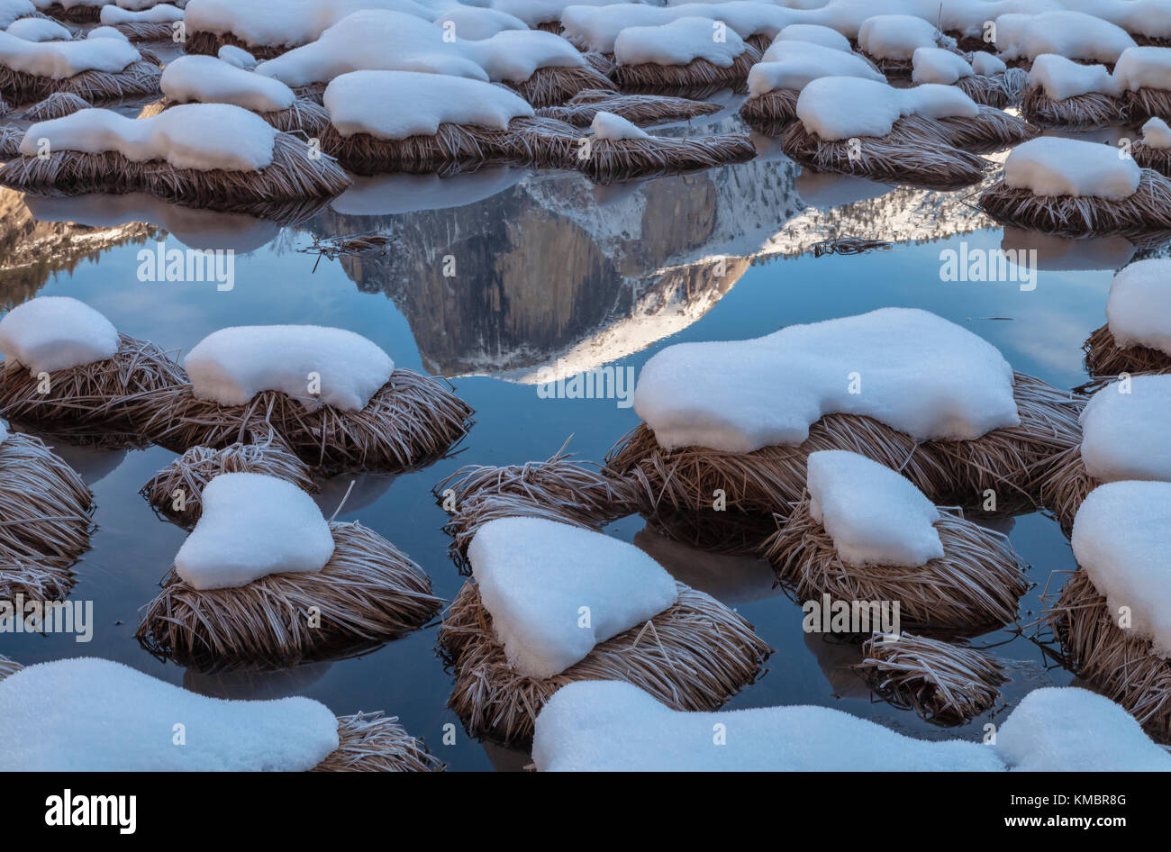 Refection of the Half Dome Peak on a small pond formed by the melting ...