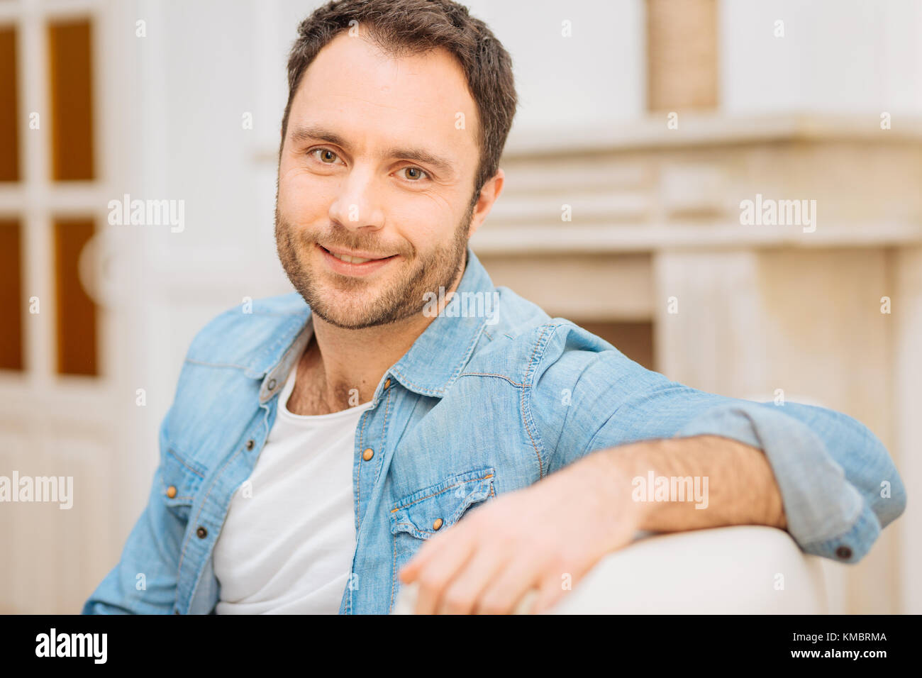 Happy enthusiastic man demonstrating his mood Stock Photo - Alamy