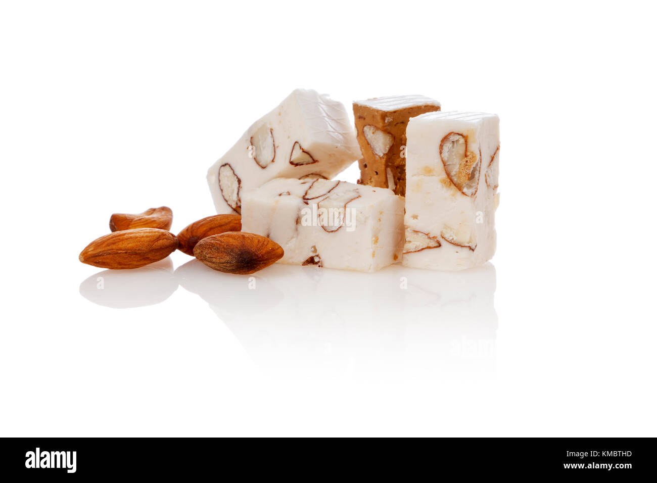 Belgian nougat blocks and almonds isolated on white Stock Photo - Alamy