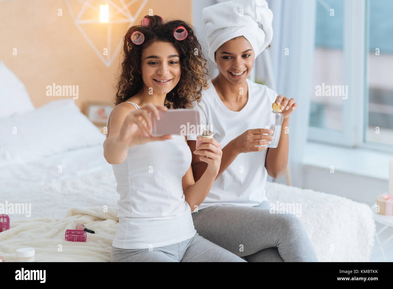 Beautiful girls posing for self portrait picture at home Stock Photo ...