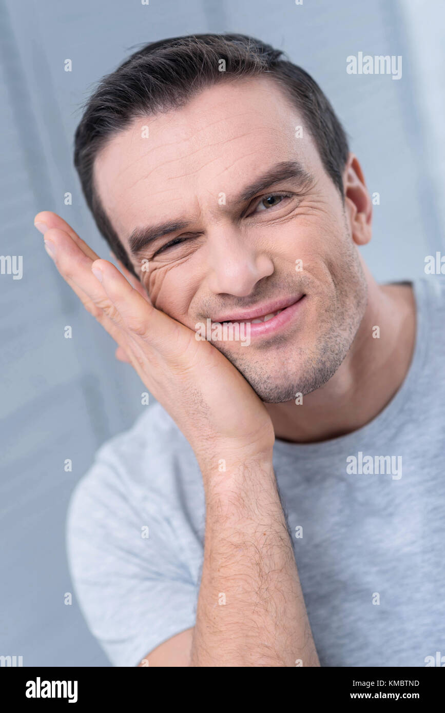 Funny vigorous man scratching his chick Stock Photo - Alamy