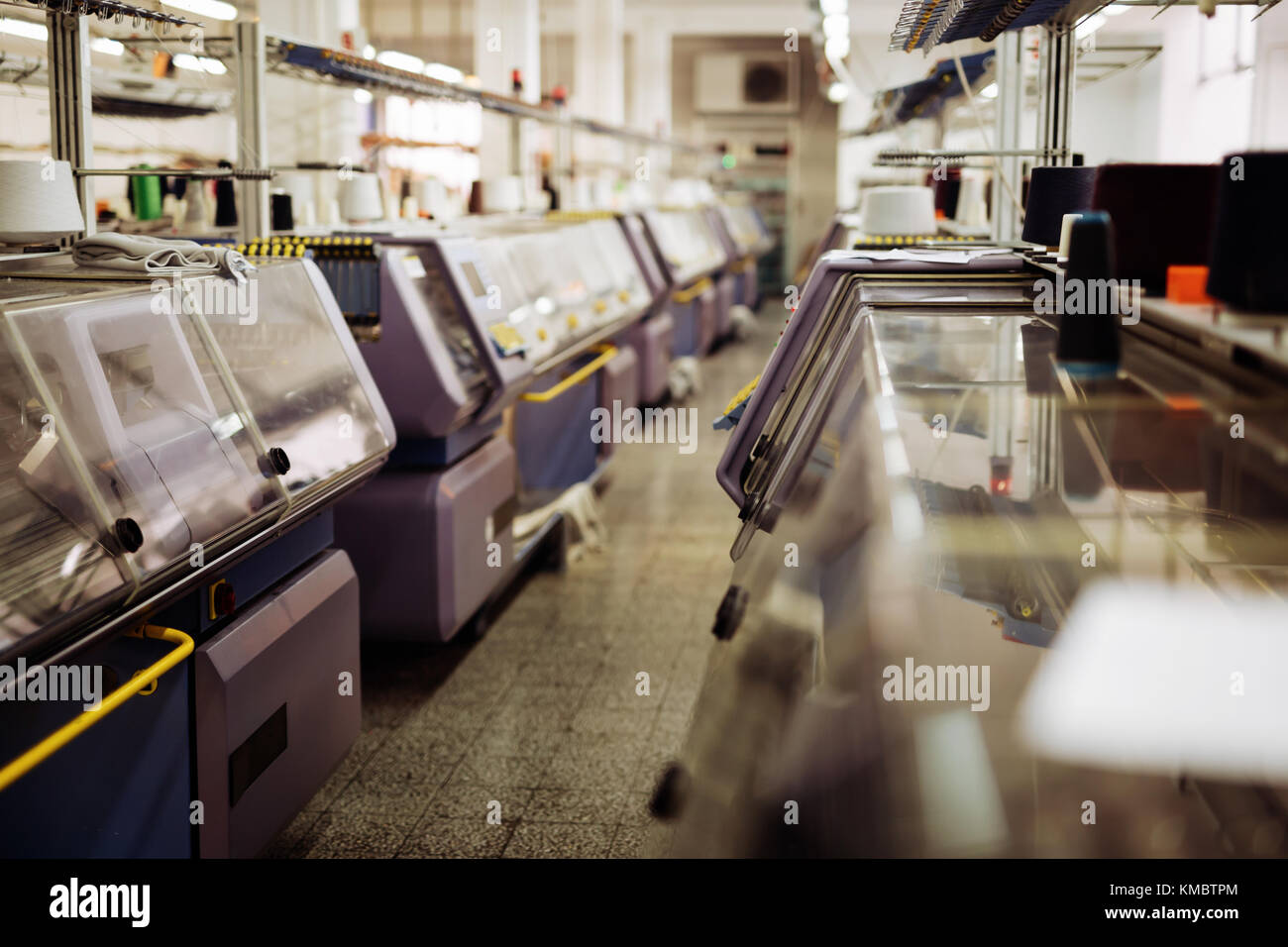 Knitting and weaving machines Stock Photo - Alamy