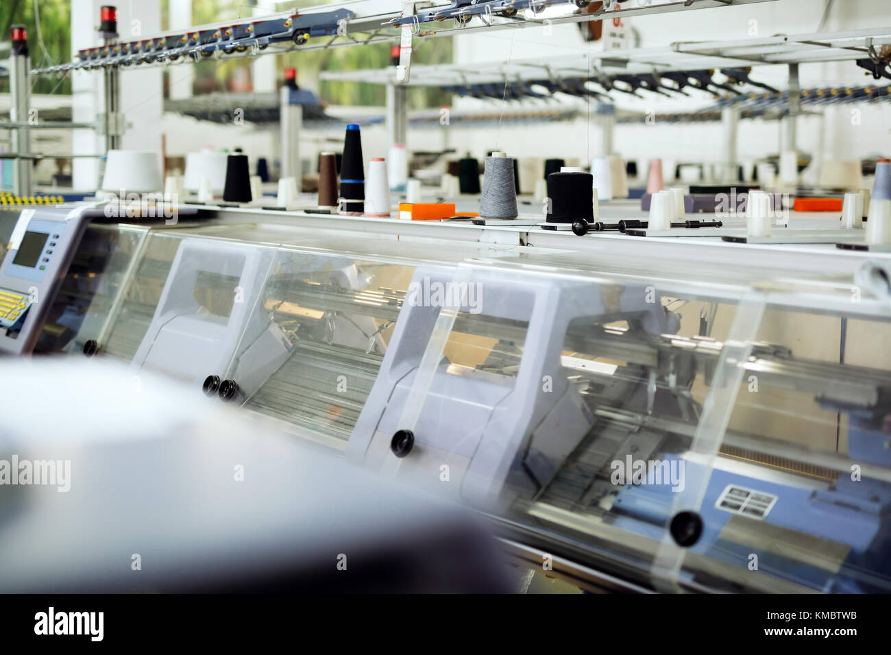 Knitting and weaving machines Stock Photo - Alamy